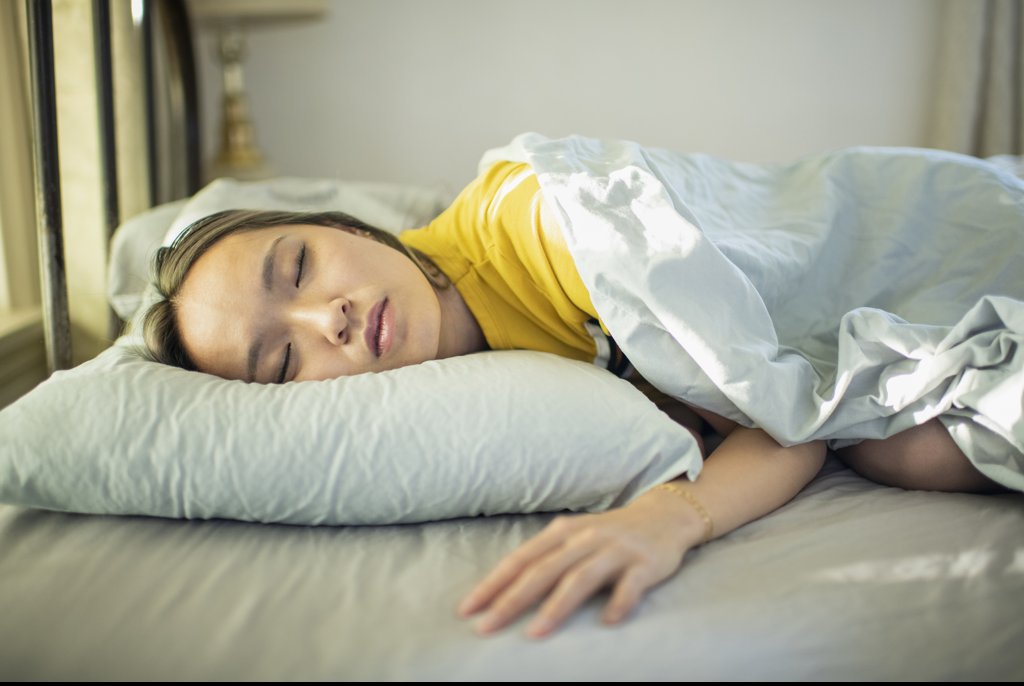 Expert reveals why you hear your heartbeat in your ear when you lie on ...